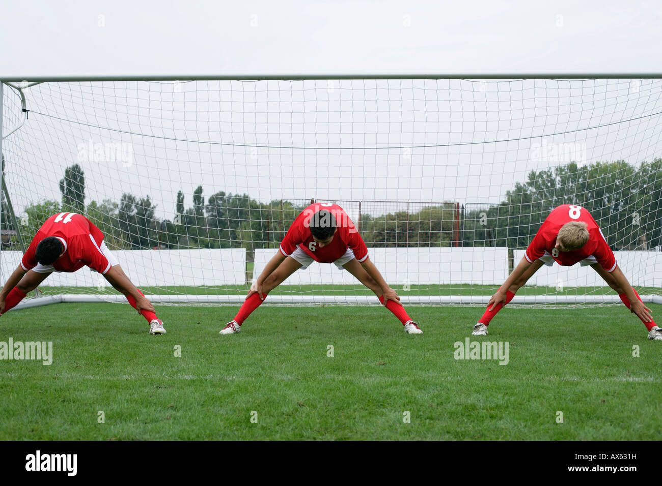 Three soccer players hi-res stock photography and images - Alamy