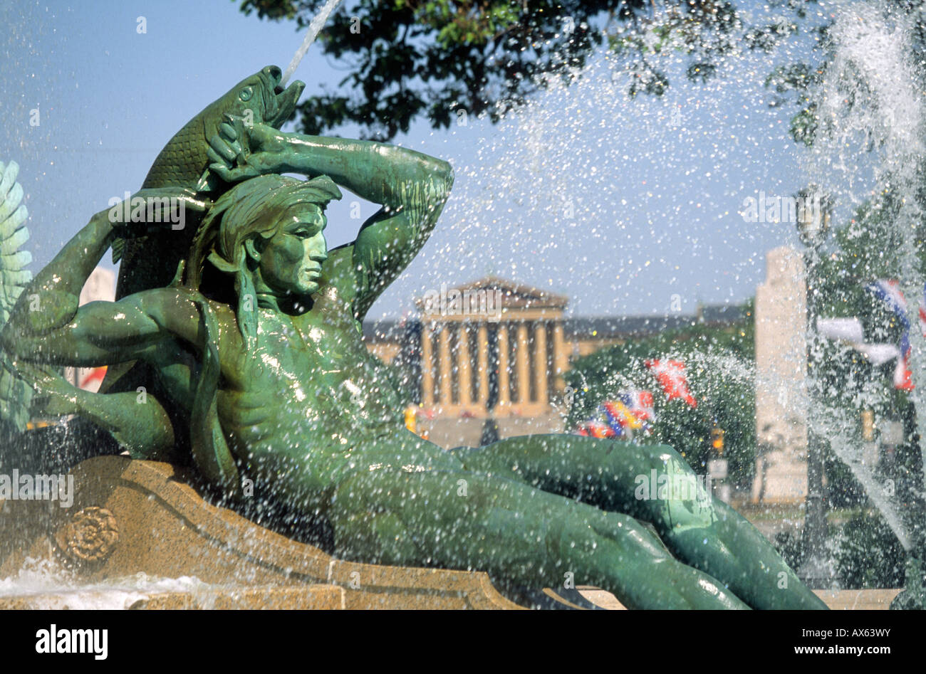 A fountain and the sculpture of an Indian in front of the Philadelphia ...