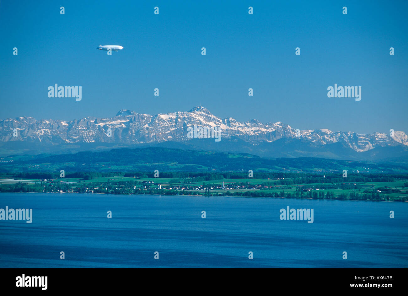 Zeppelin aircraft over Lake Constance Saentis Mountain from Meersburg ...