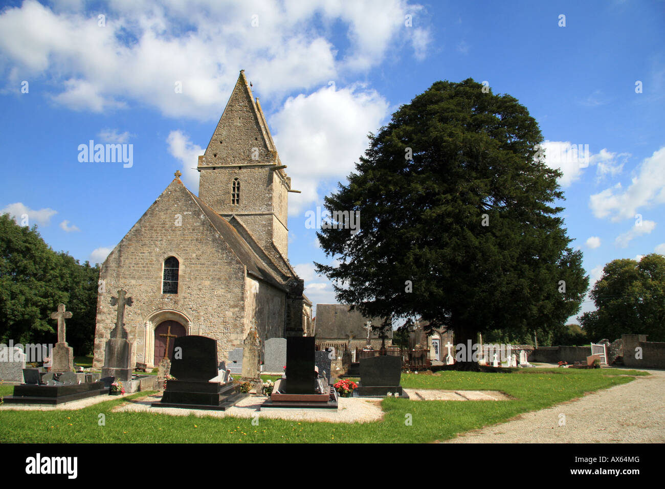 Inside the churchyard of the village church in Angoville-au-Plain, (Nr ...