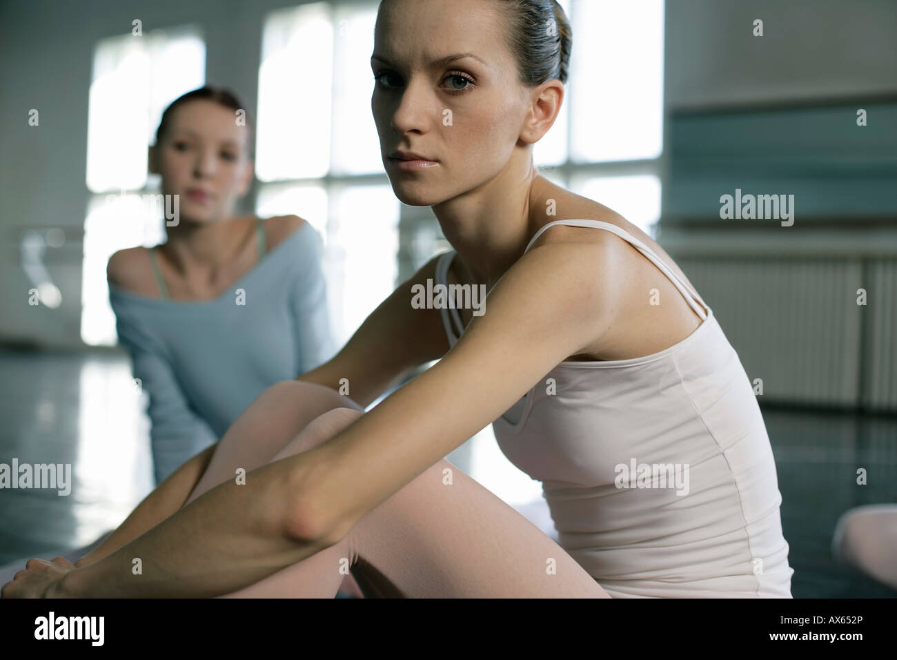 A female ballet dancer looking at camera Stock Photo - Alamy