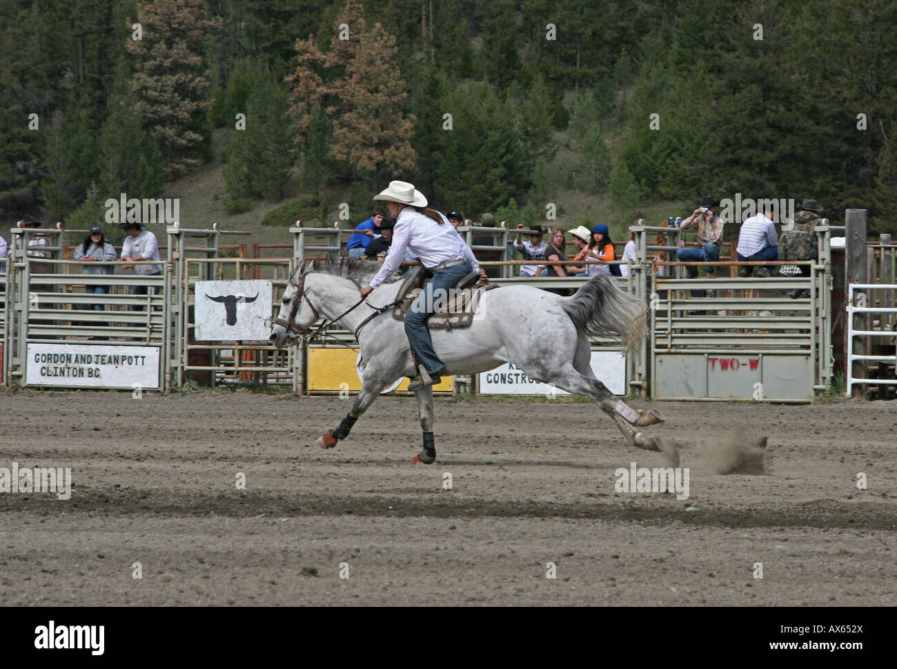 Barrel racing at a rodeo Stock Photo - Alamy