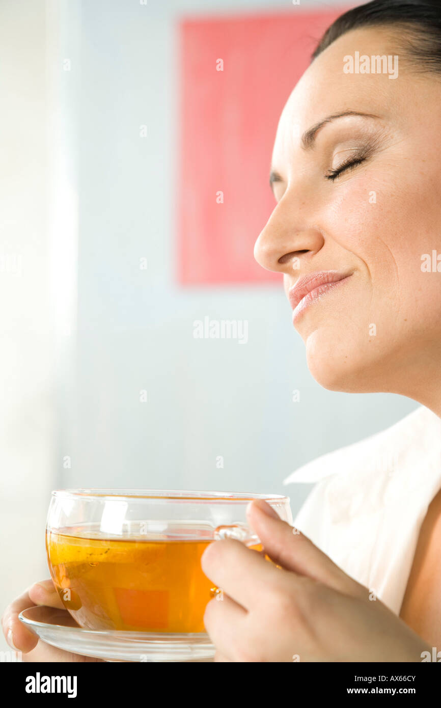 woman drinking tea Stock Photo - Alamy