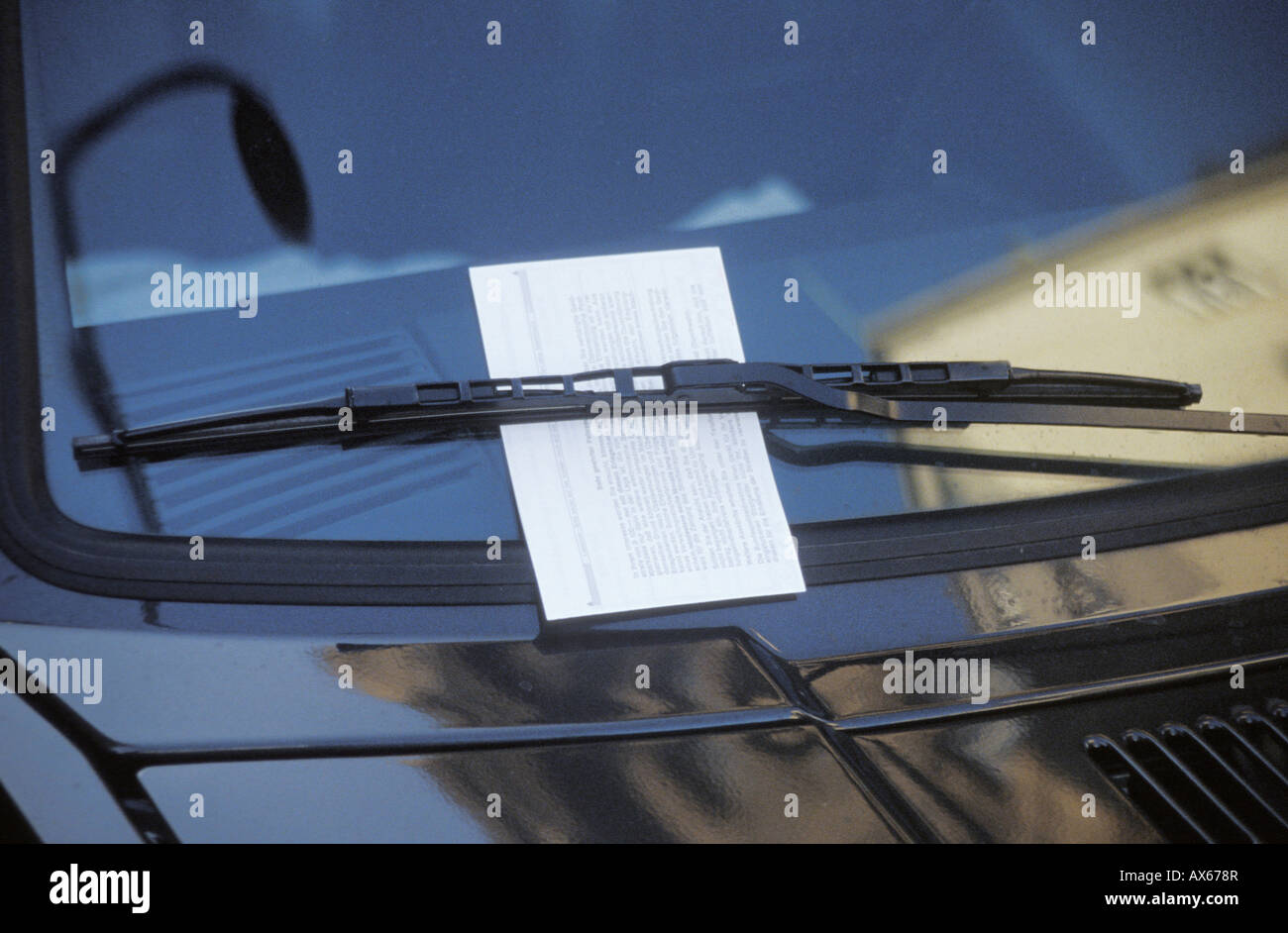 ticket on the windshield because of wrong parking Stock Photo - Alamy