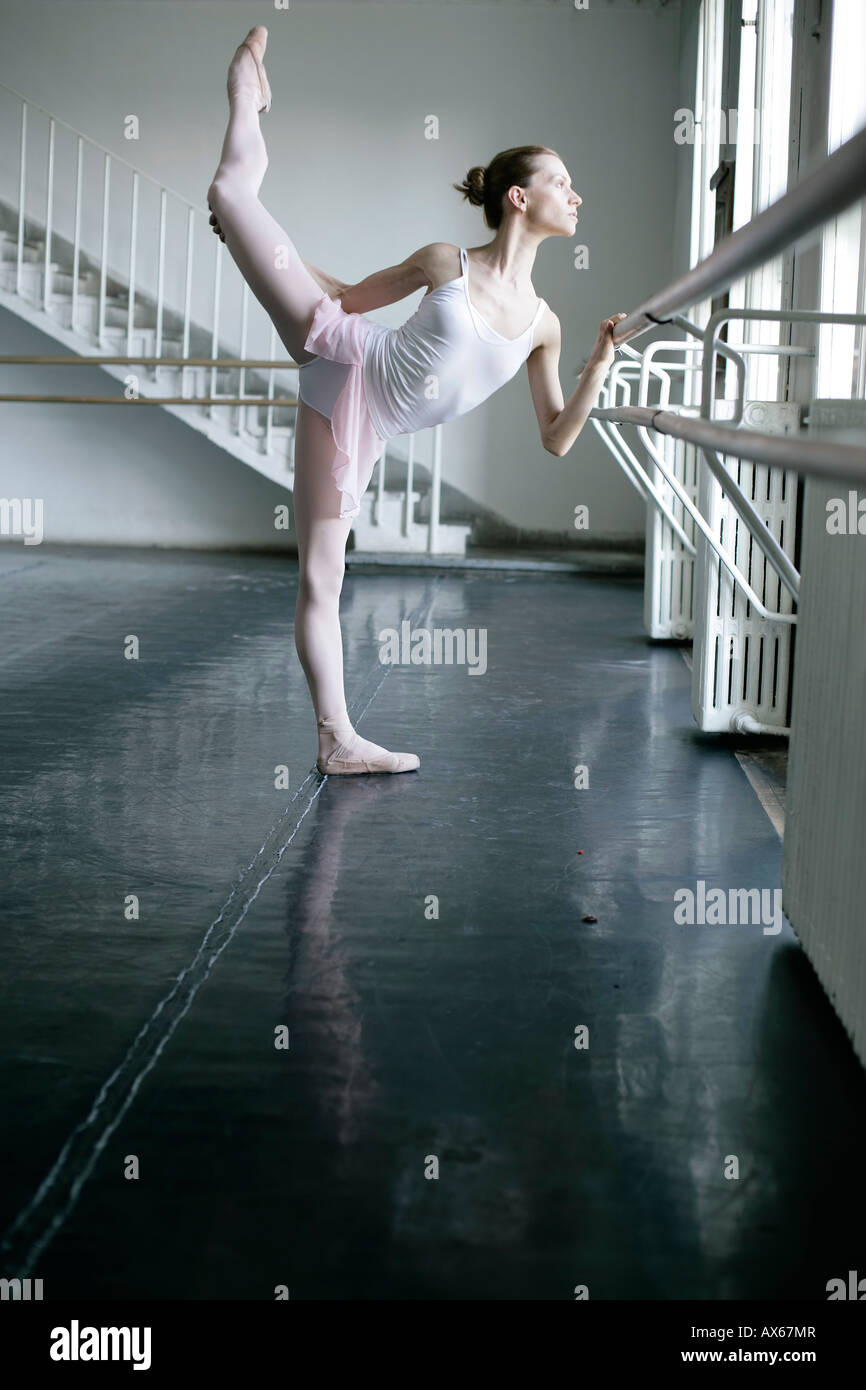 A female ballet dancer doing stretching exercises Stock Photo - Alamy
