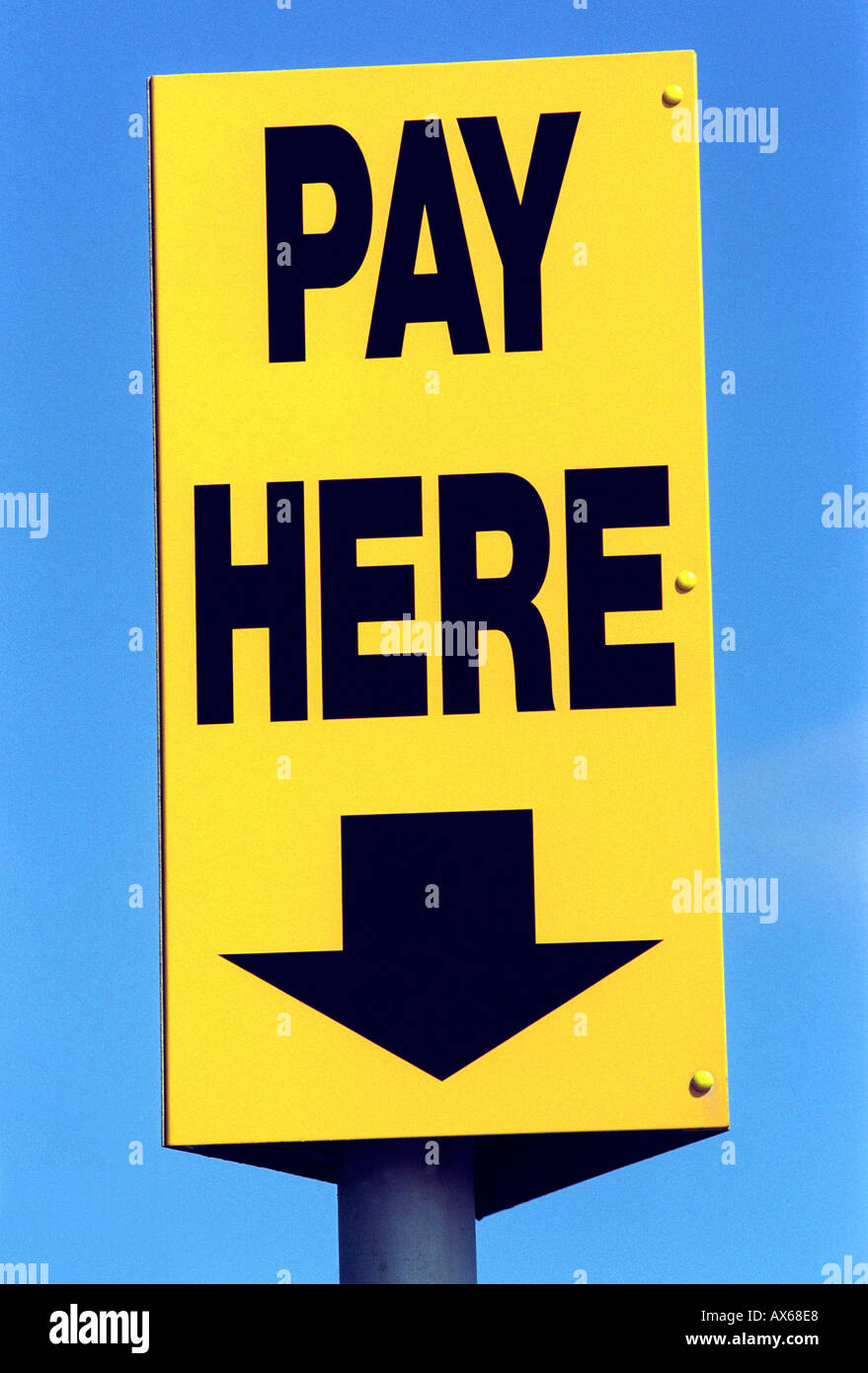 Pay Here sign Stock Photo - Alamy