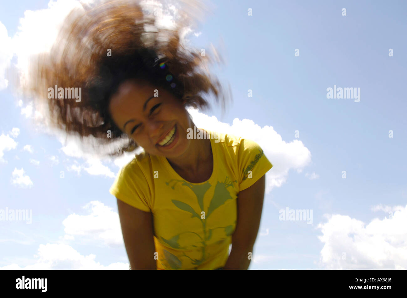 Young woman shaking hair, portrait Stock Photo - Alamy
