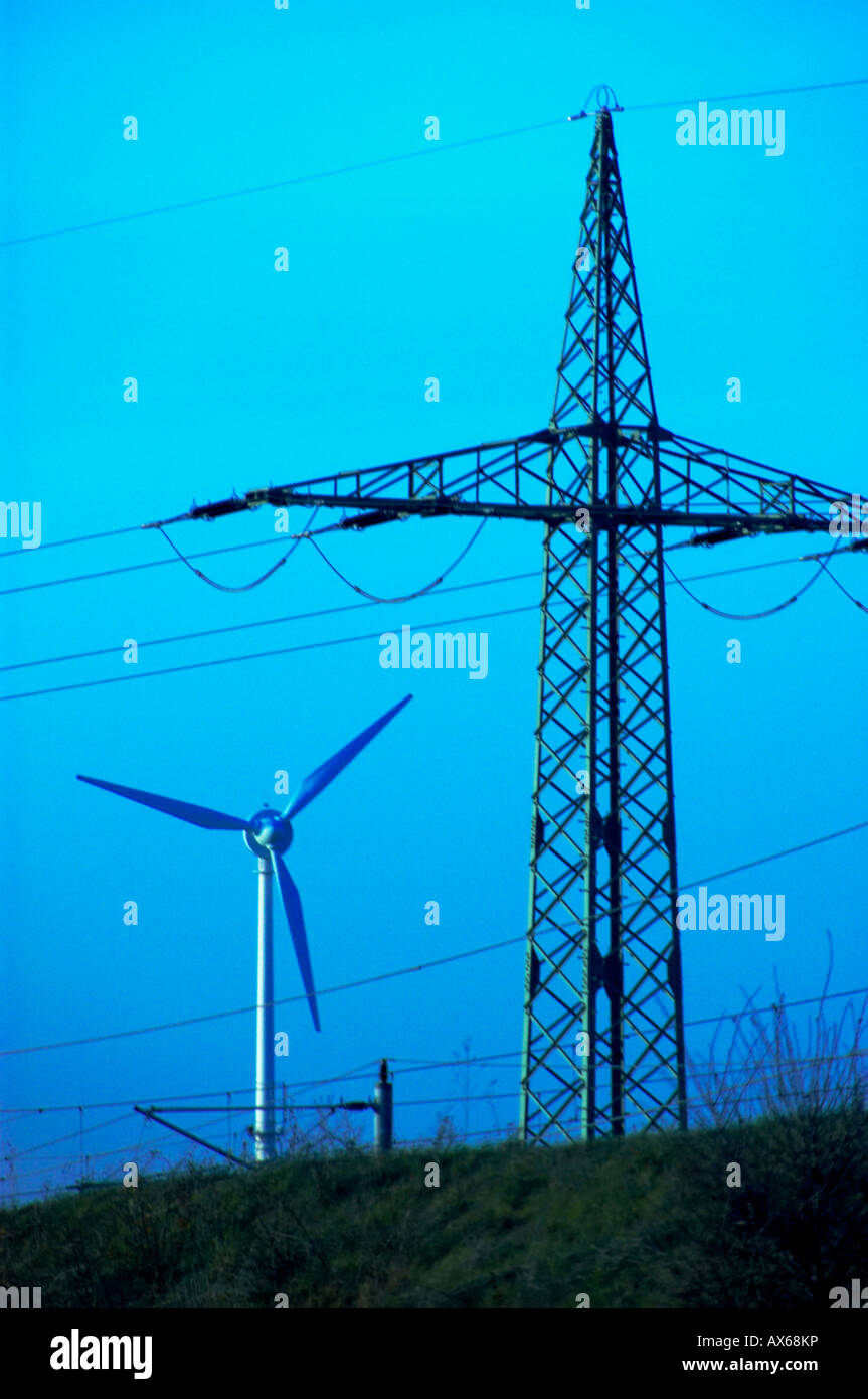 Wind turbine and transmission line Stock Photo - Alamy