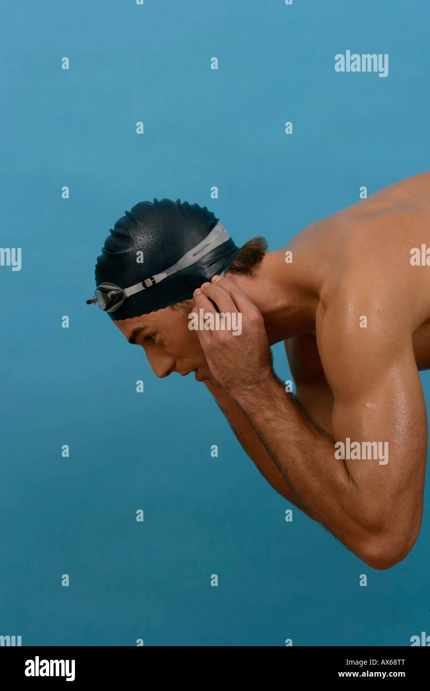 A male swimmer preparing to dive Stock Photo - Alamy
