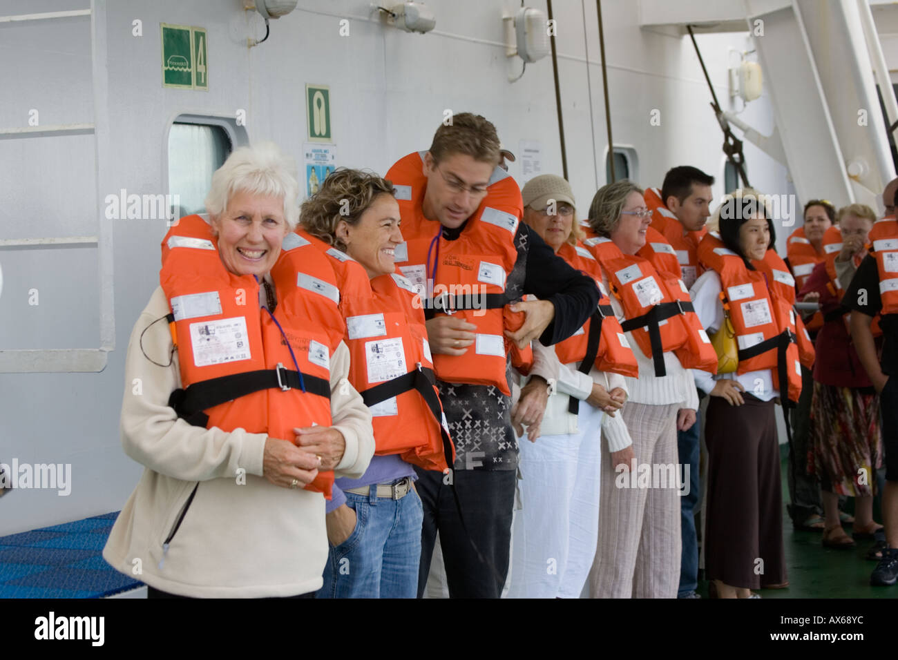 Passengers on Acciona ferry having fun carrying out lifejacket drill en ...