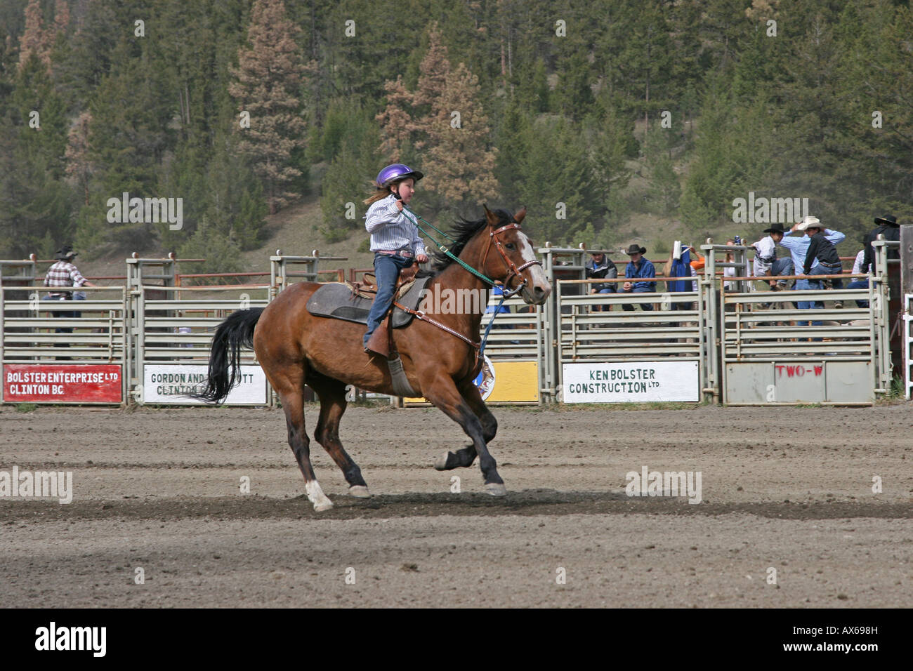 Young girl barrel racing at a rodeo Stock Photo - Alamy