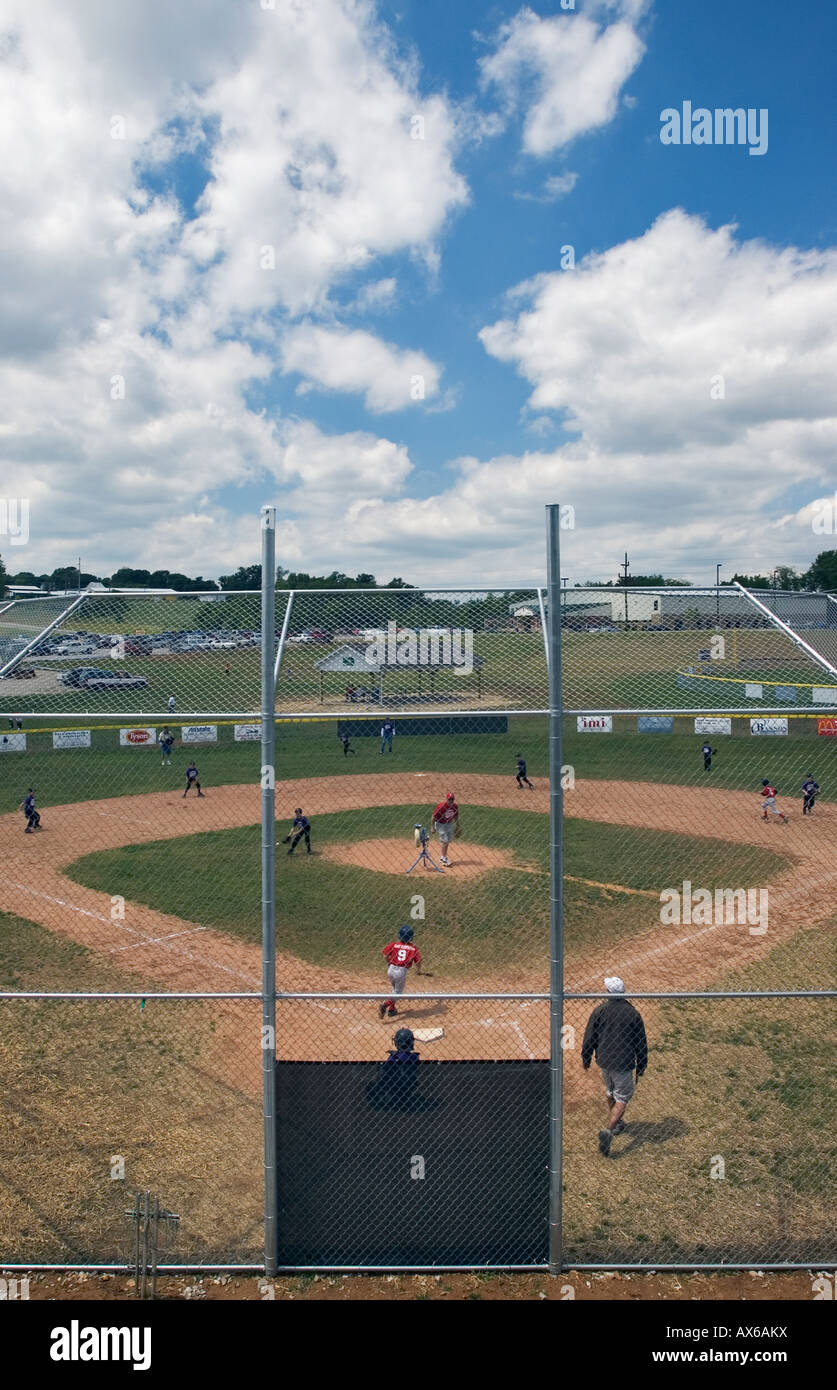 Chain link fence little league baseball hi-res stock photography and ...
