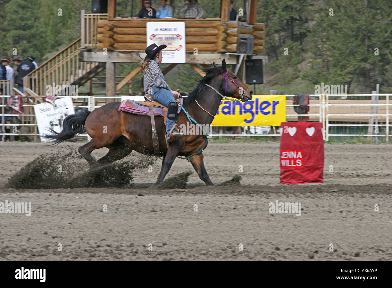 Barrel racing at a rodeo Stock Photo - Alamy