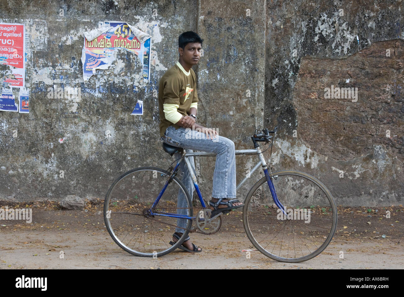 Indian boy on bicycle in hi-res stock photography and images - Alamy
