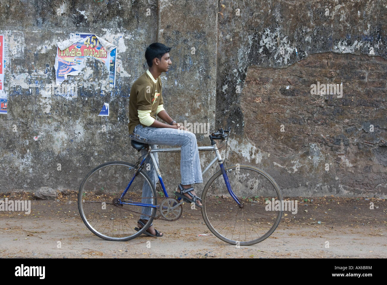 Indian boy on bicycle in hi-res stock photography and images - Alamy