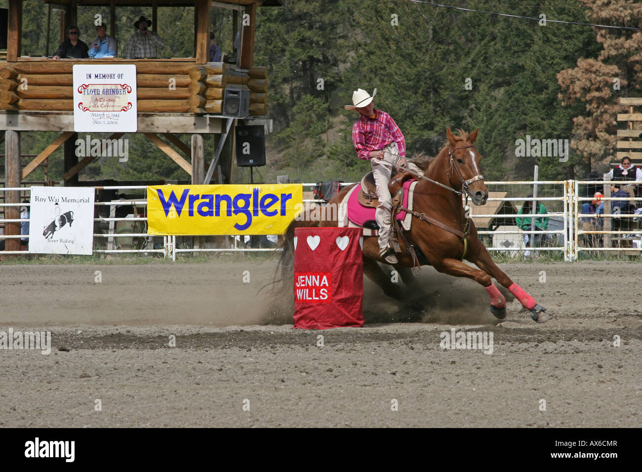 Young girl barrel racing at a rodeo Stock Photo - Alamy