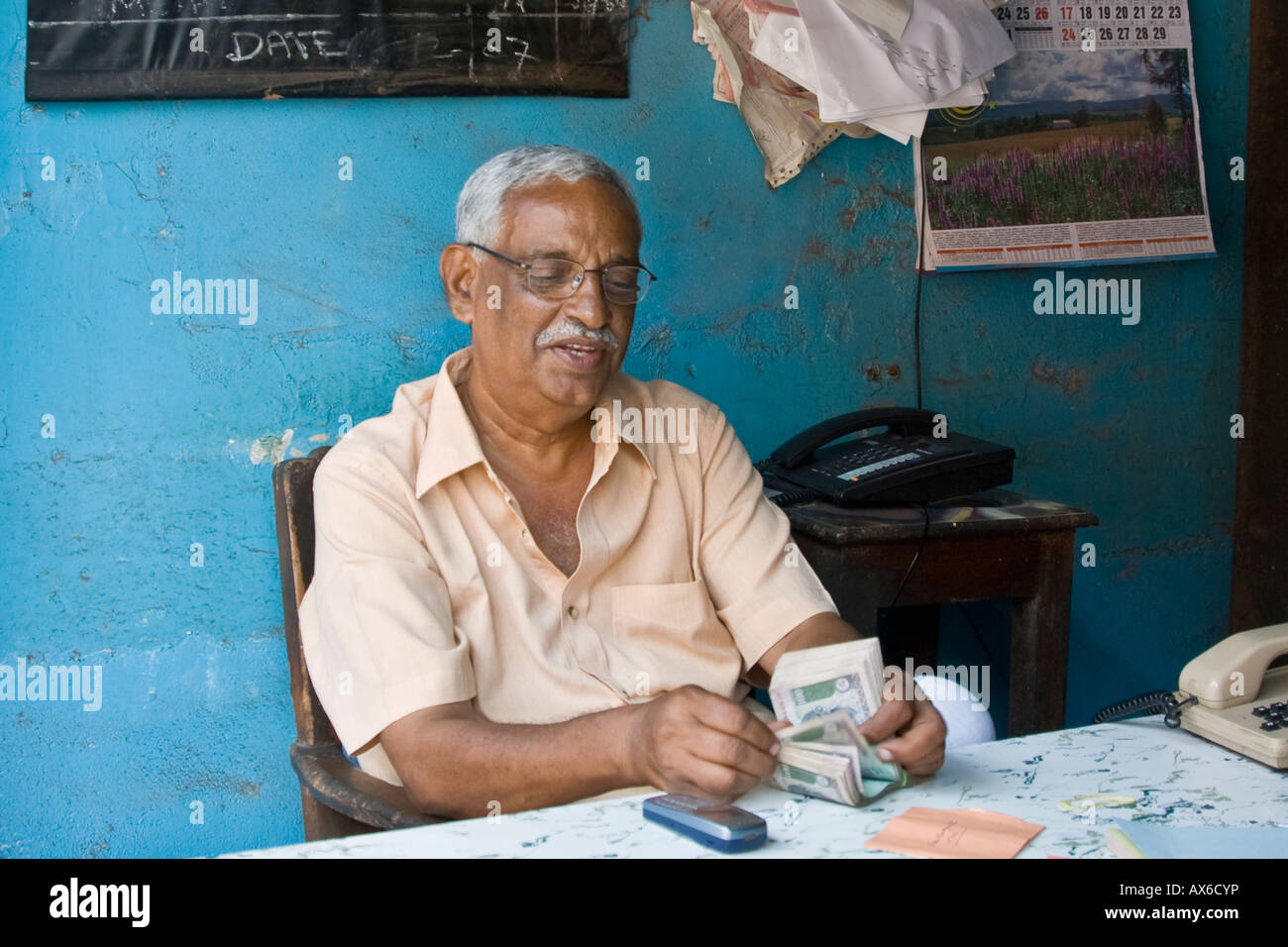Indian Merchant Counting Money in His Shop in Mattancherry Cochin India ...