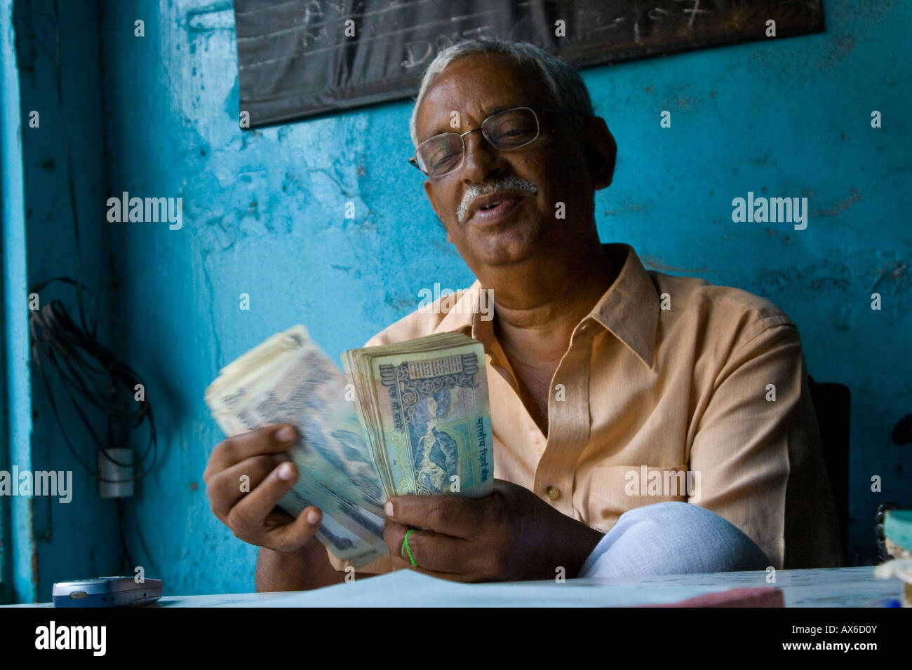 Indian Merchant Counting Money in His Shop in Mattancherry Cochin India ...