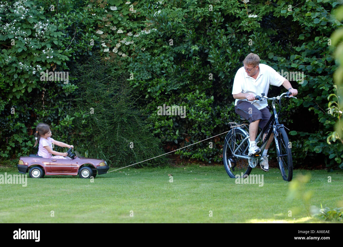 Girl towed hi-res stock photography and images - Alamy