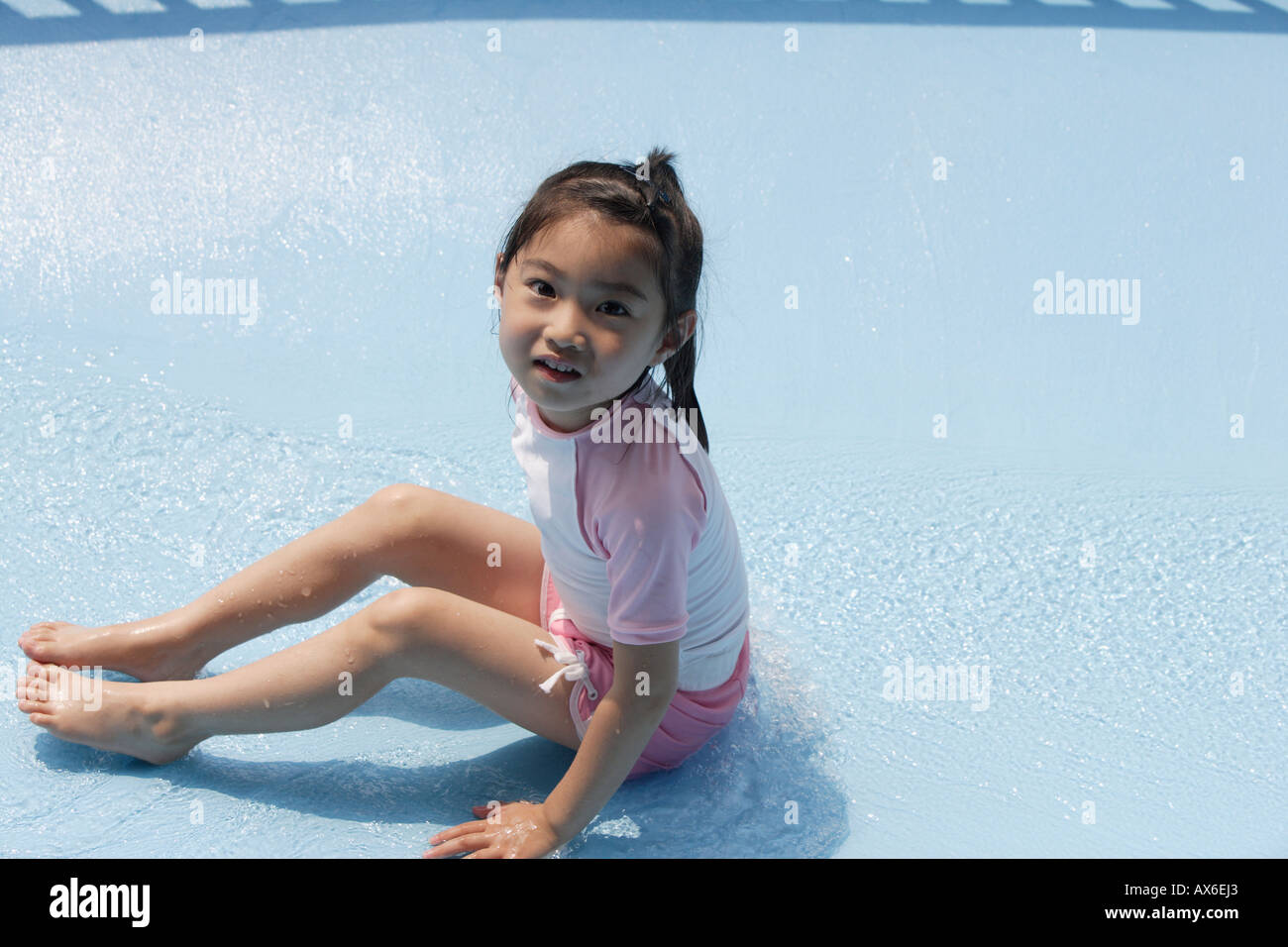 A girl in a pool Stock Photo - Alamy