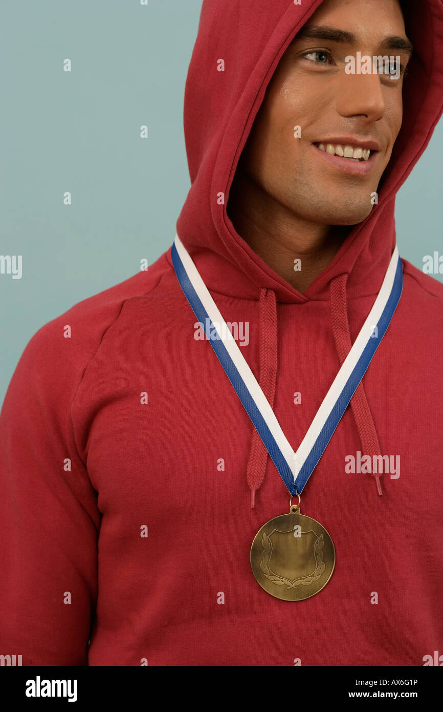 A athlete wearing a medal Stock Photo - Alamy