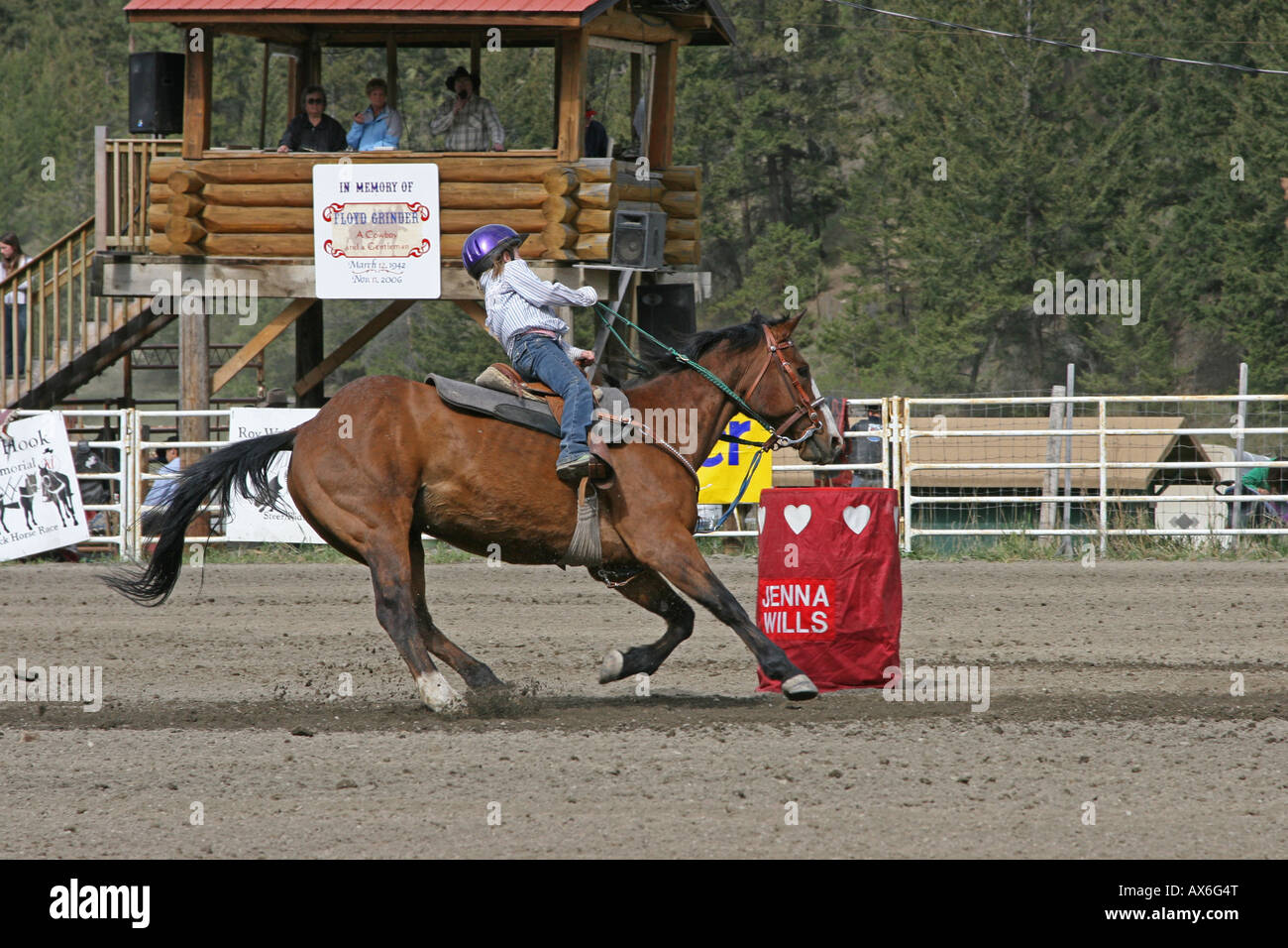 Young girl barrel racing at a rodeo Stock Photo - Alamy