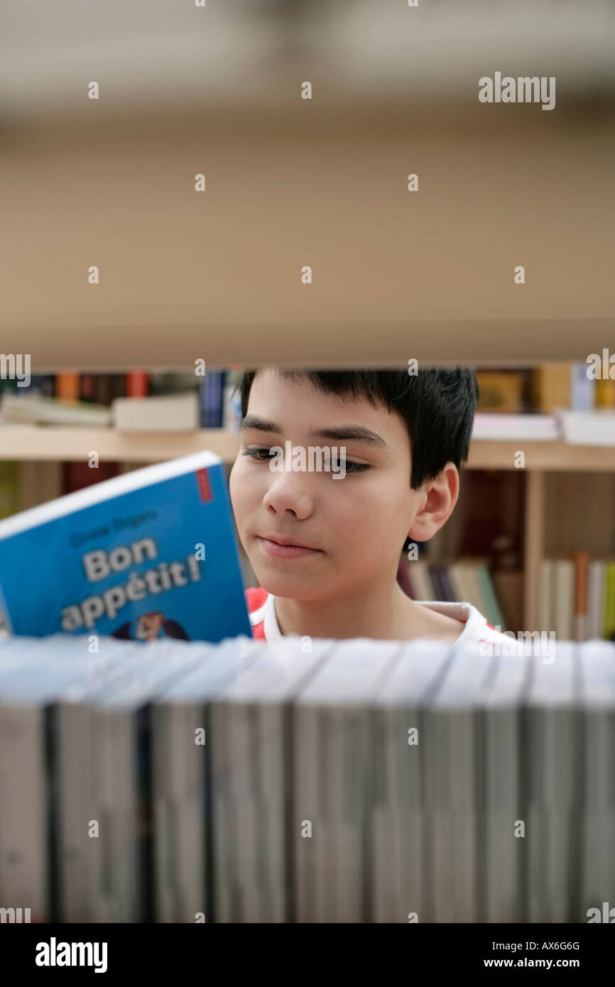 Boy reading a book, fully released Stock Photo - Alamy