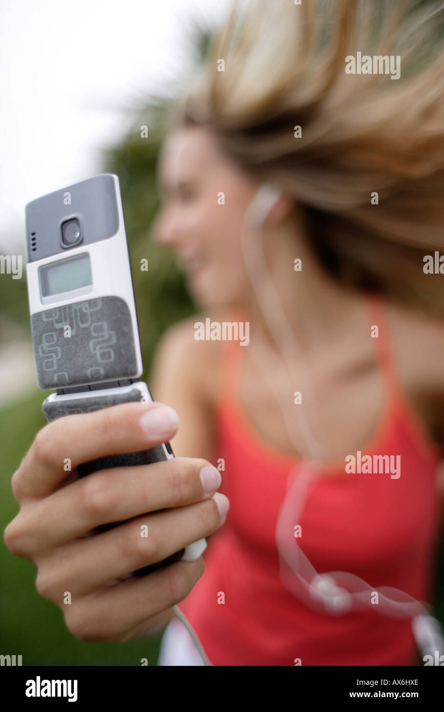 Young woman dancing outdoors orange hi-res stock photography and images ...