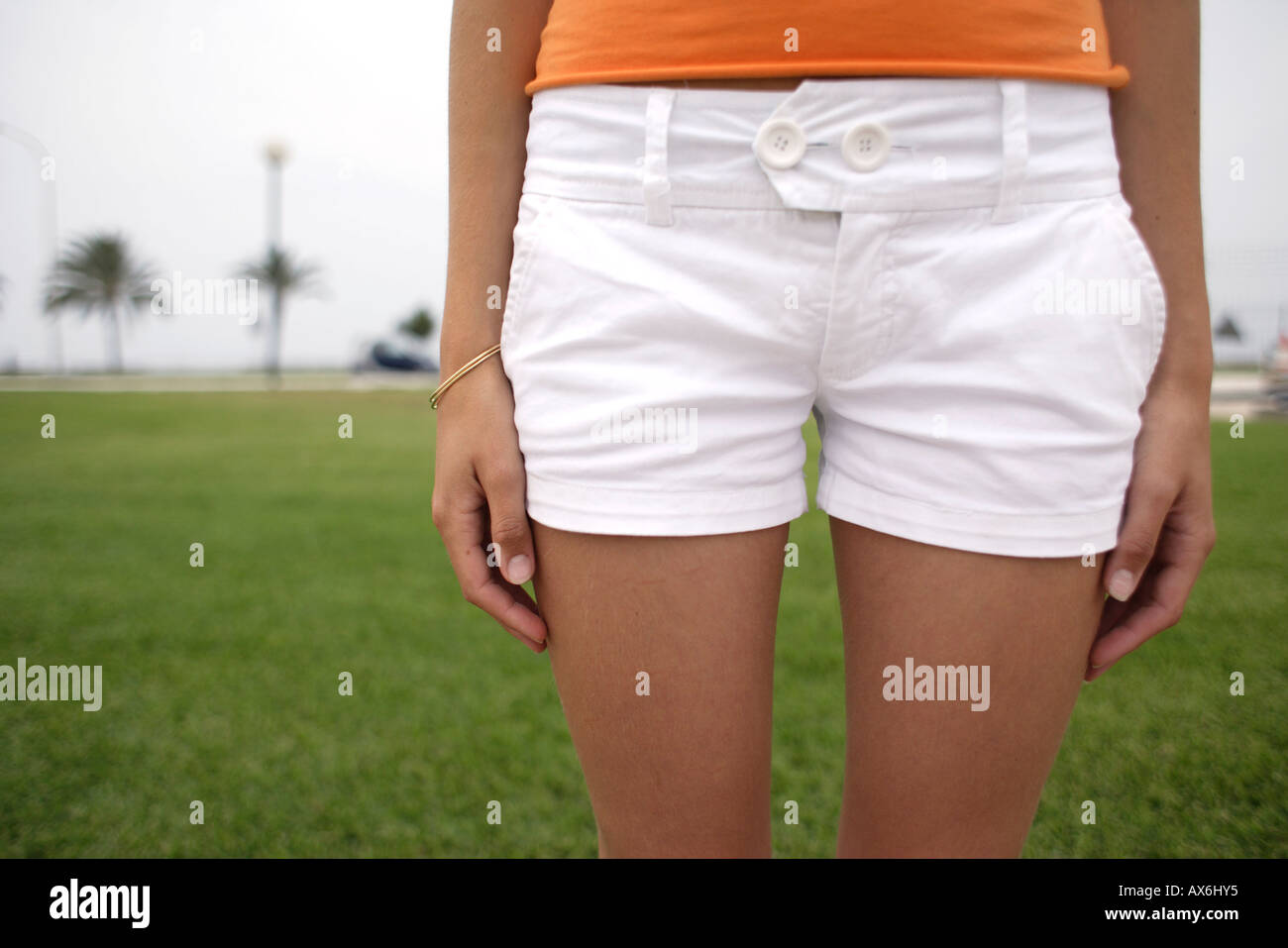 Young woman wearing white shorts hi-res stock photography and images ...