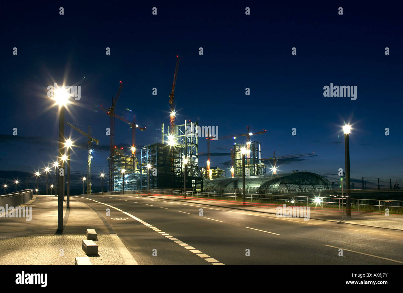 Streetlights along road lit up at night, Spreebogen, Berlin, Germany ...