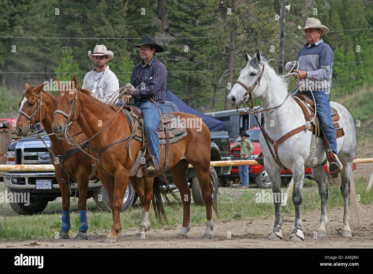 Three cowboys at a rodeo Stock Photo - Alamy