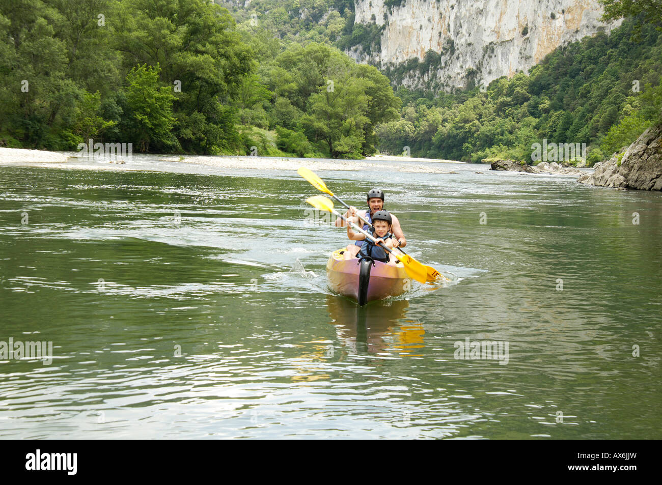 Boy rowing boat hi-res stock photography and images - Alamy