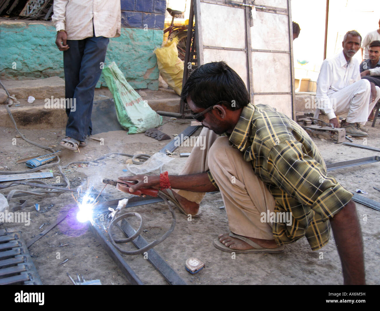 Man welding with sunglasses Rajasthan India Stock Photo - Alamy
