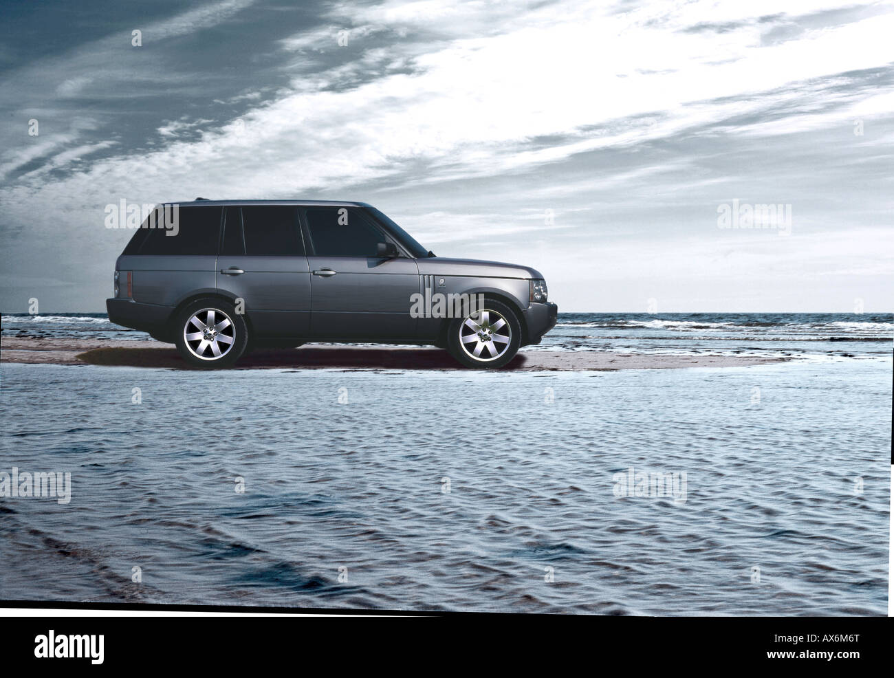 Car on beach Stock Photo - Alamy