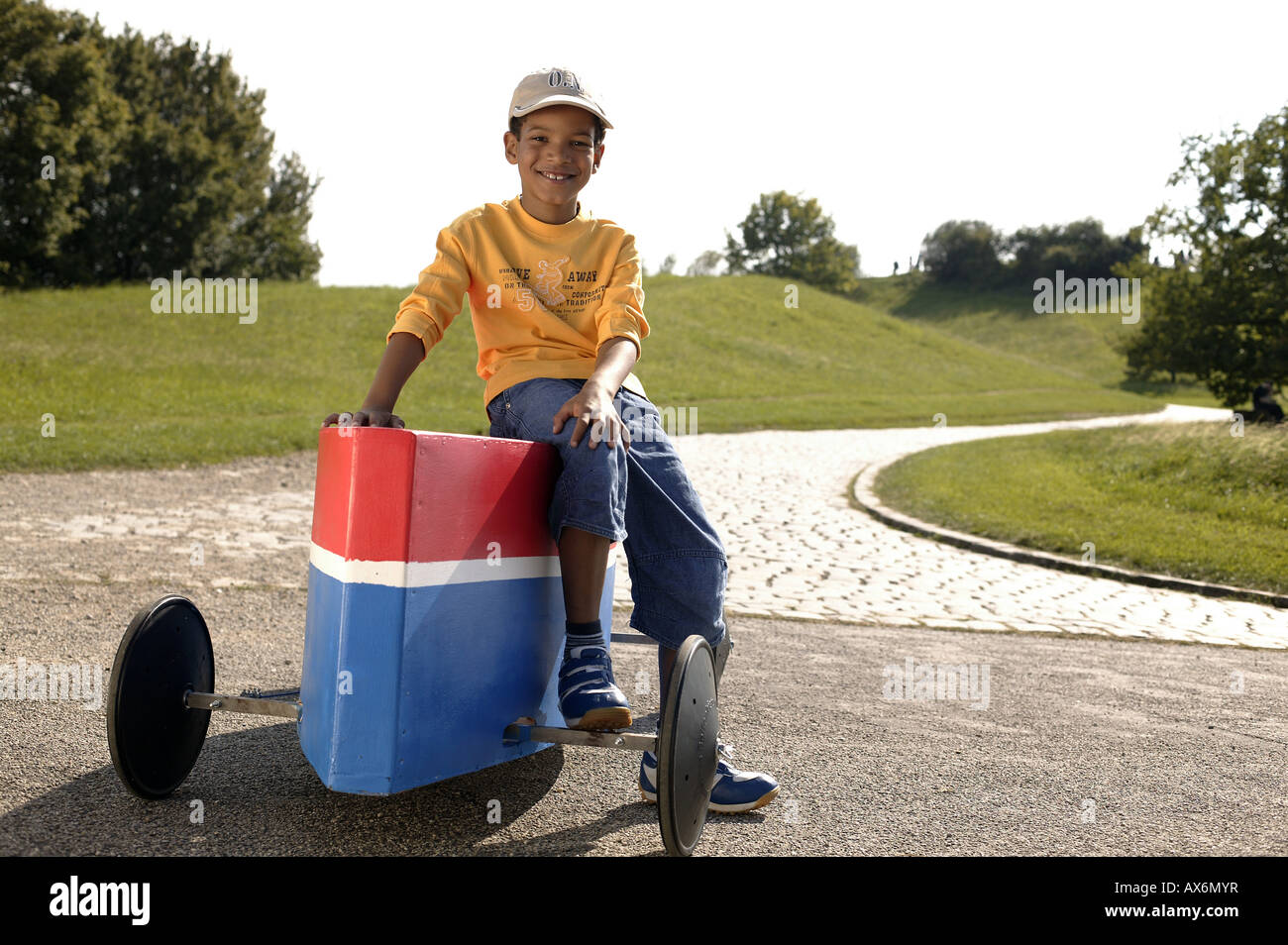 Boy sitting on soap box hi-res stock photography and images - Alamy