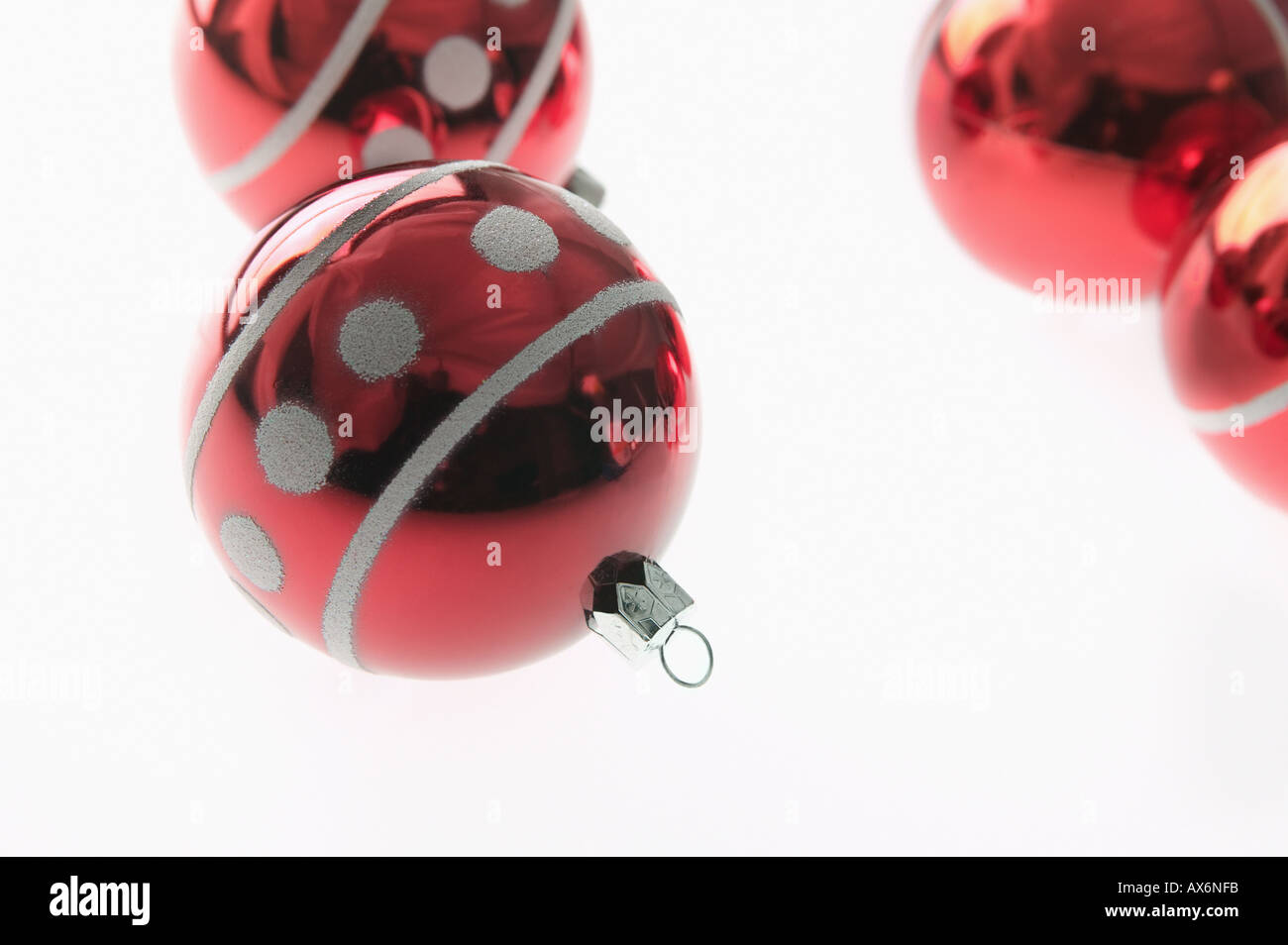 Four red christmas baubles hi-res stock photography and images - Alamy