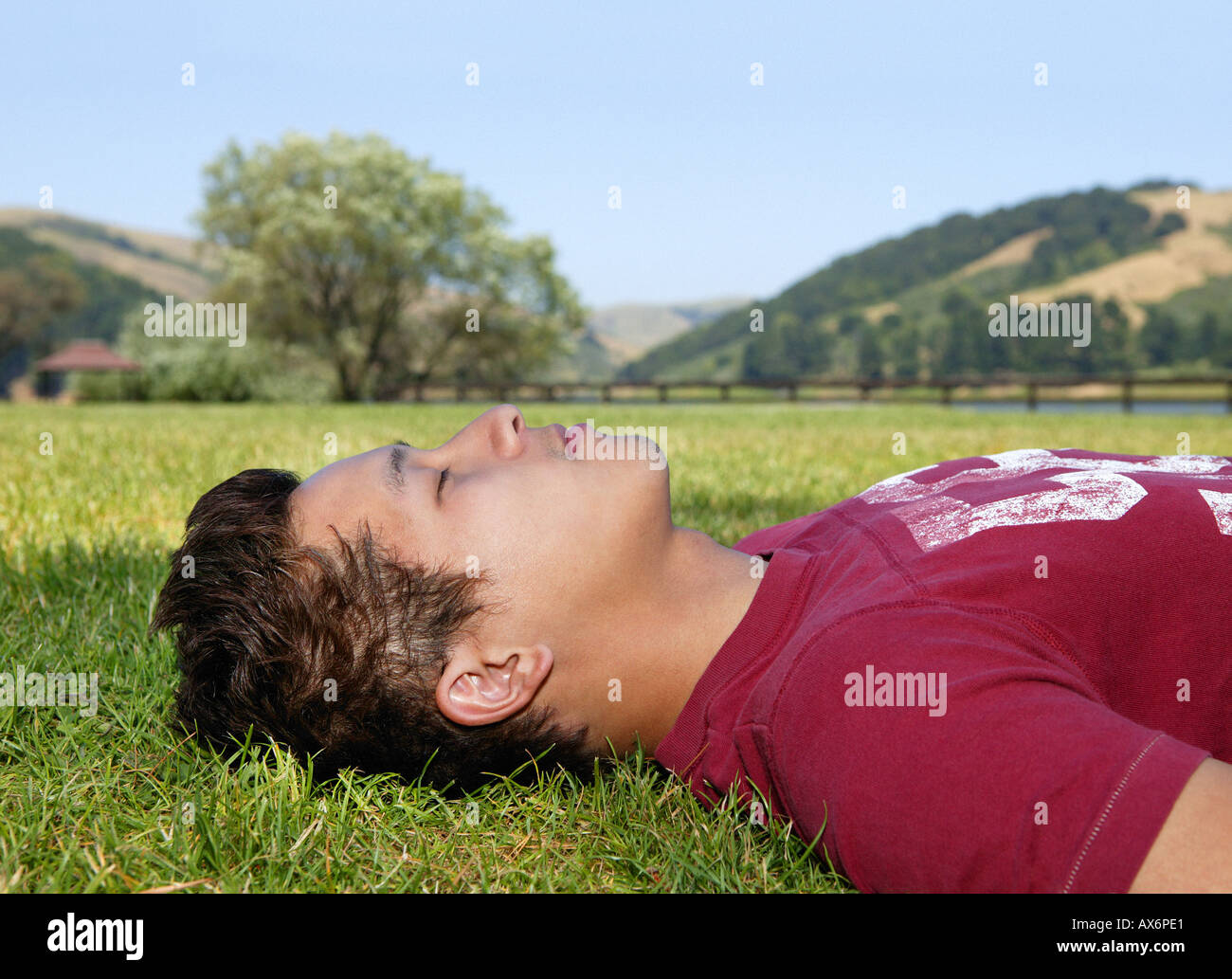 Man sleeping outside Stock Photo - Alamy