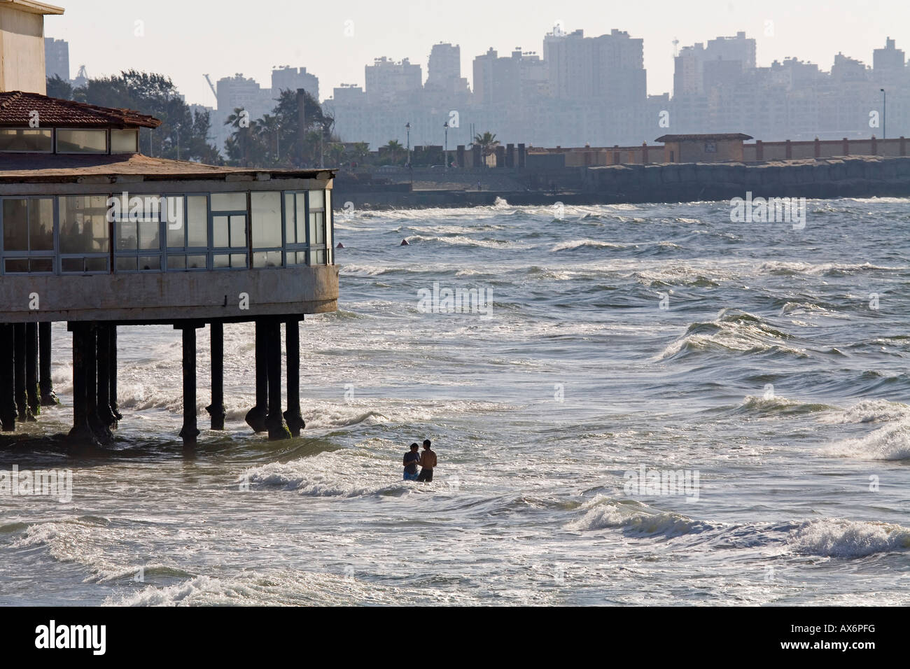 Two people on beach Stock Photo - Alamy