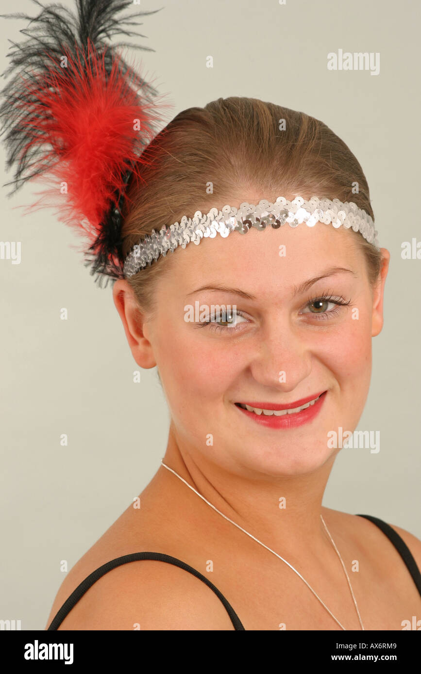 Woman wearing feather boa hi-res stock photography and images - Alamy