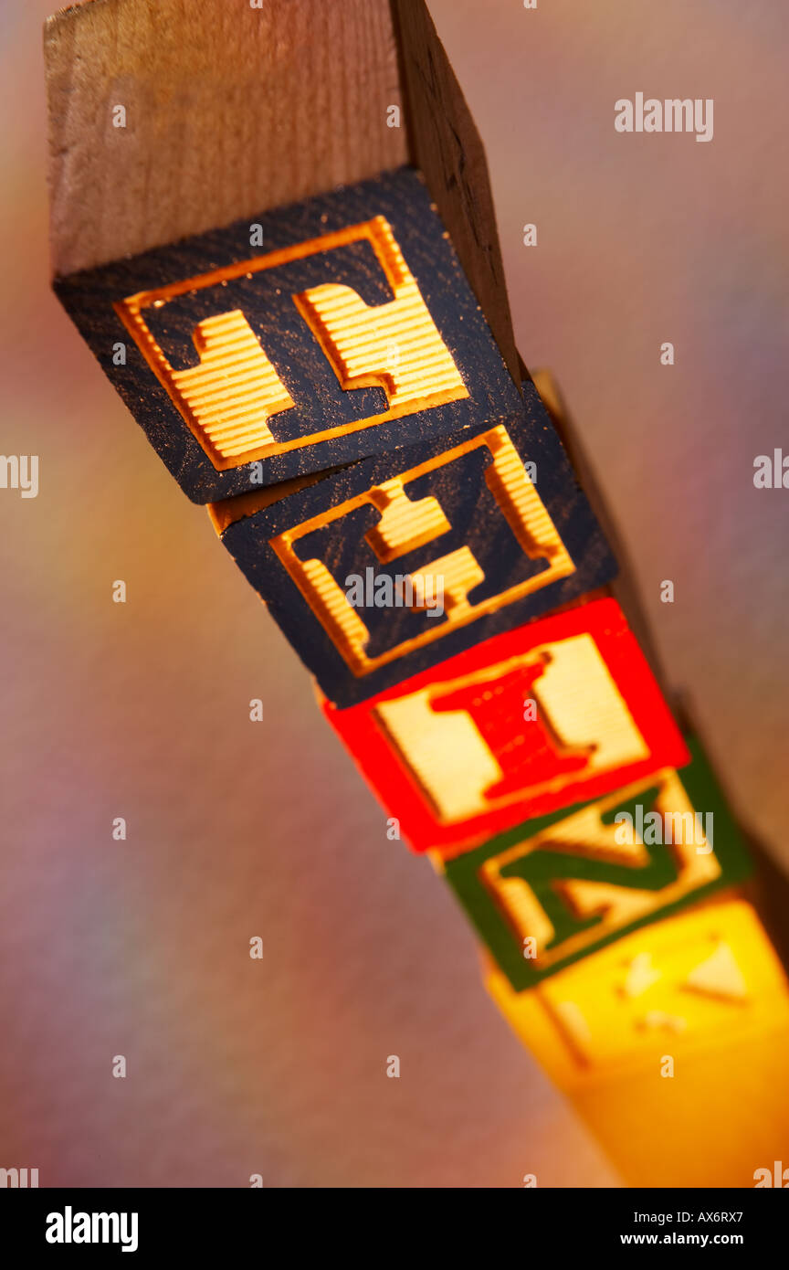 STACK OF WOODEN TOY BUILDING BLOCKS SPELLING THE WORD THINK Stock Photo ...