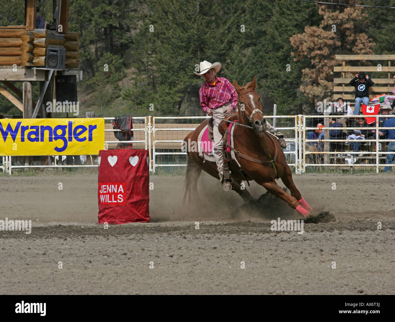 Young girl barrel racing at a rodeo Stock Photo - Alamy