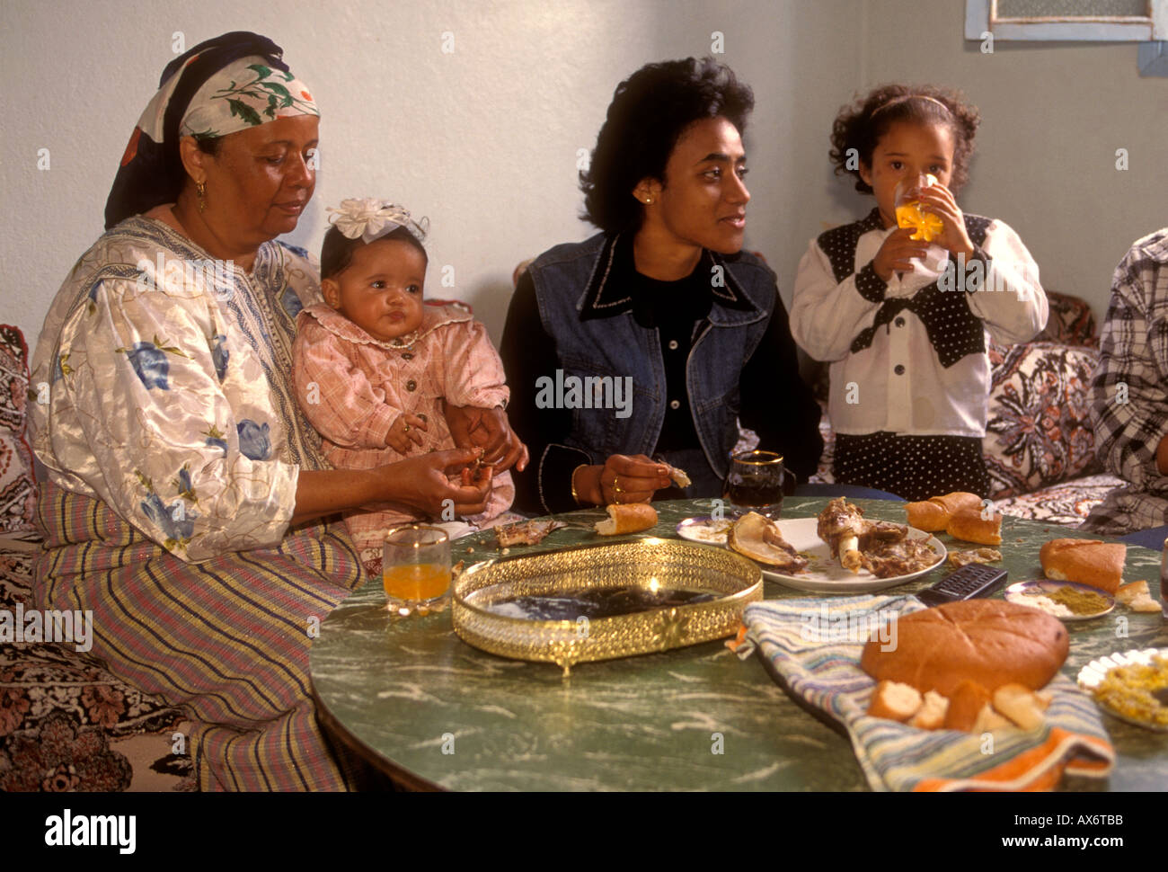 Moroccan family, eating lunch, at home, Fes el-Bali, city of Fez ...