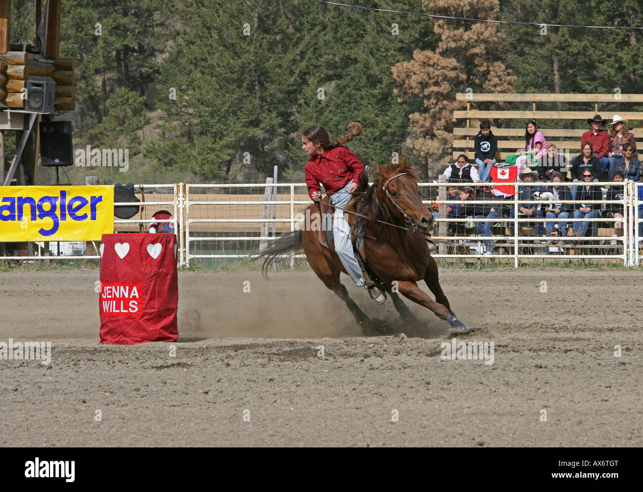 Young girl barrel racing at a rodeo Stock Photo - Alamy