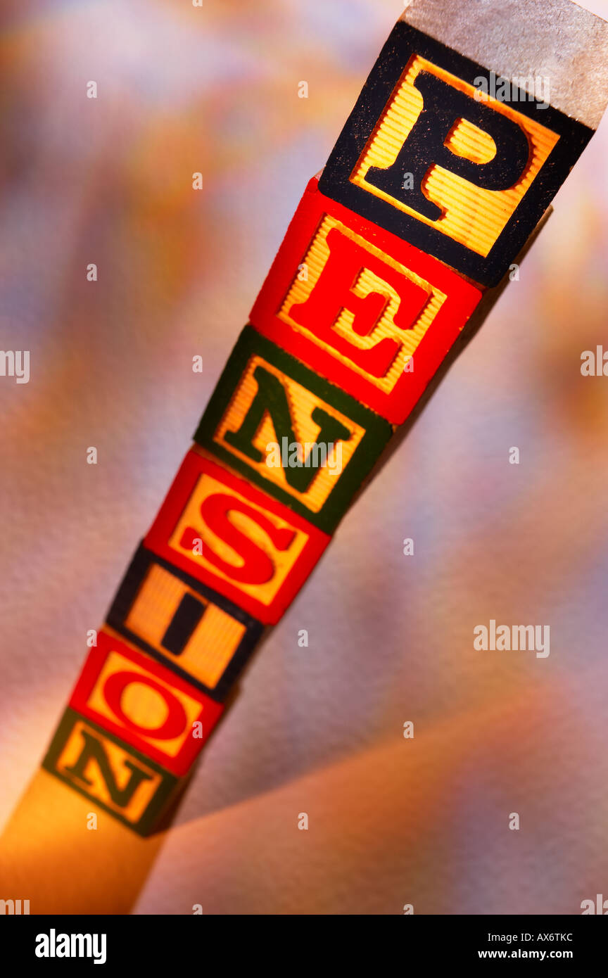 STACK OF WOODEN TOY BUILDING BLOCKS SPELLING THE WORD PENSION Stock ...