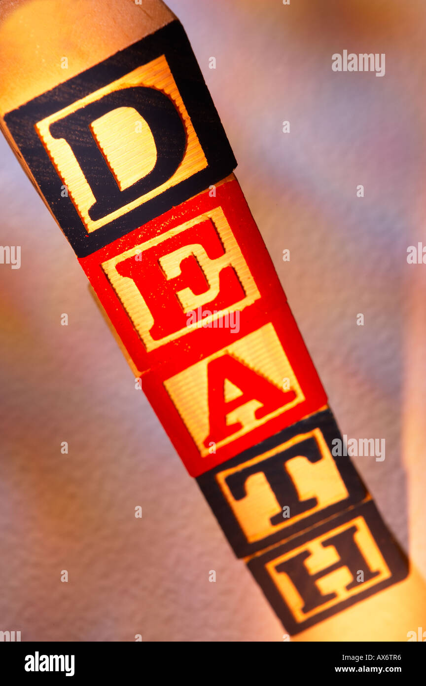 STACK OF WOODEN TOY BUILDING BLOCKS SPELLING THE WORD DEATH Stock Photo ...
