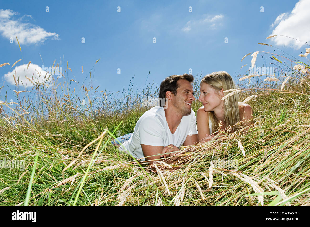 Woman lying in field wheat hi-res stock photography and images - Alamy