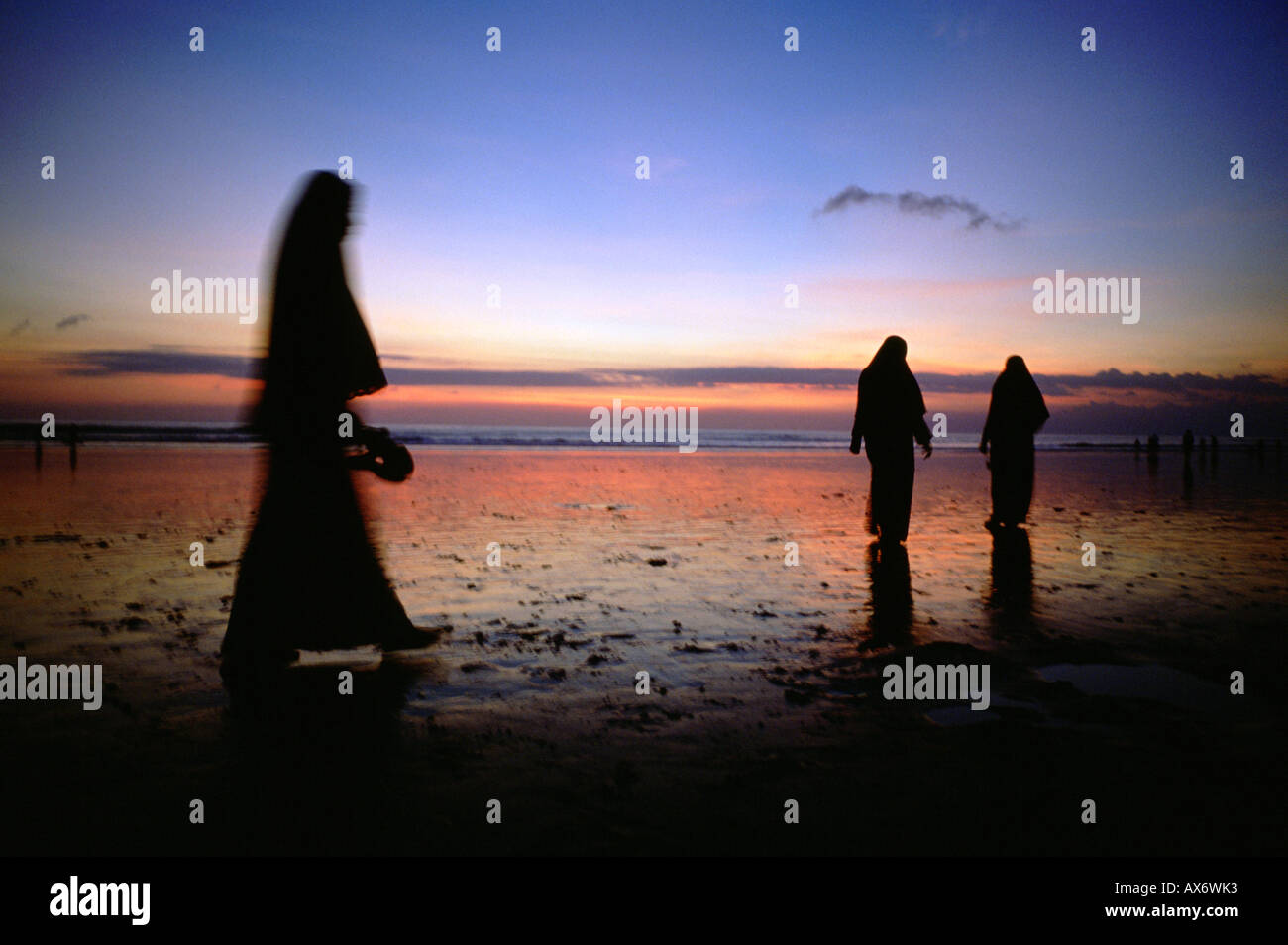Muslim Tourists from Java Indonesia wearing headscarfs walk along the ...