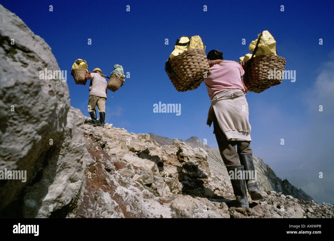 Men working inside the live volcano of Kawah Ijen in East Java ...