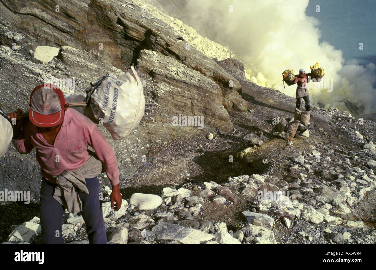 Men working inside the live volcano of Kawah Ijen in East Java ...