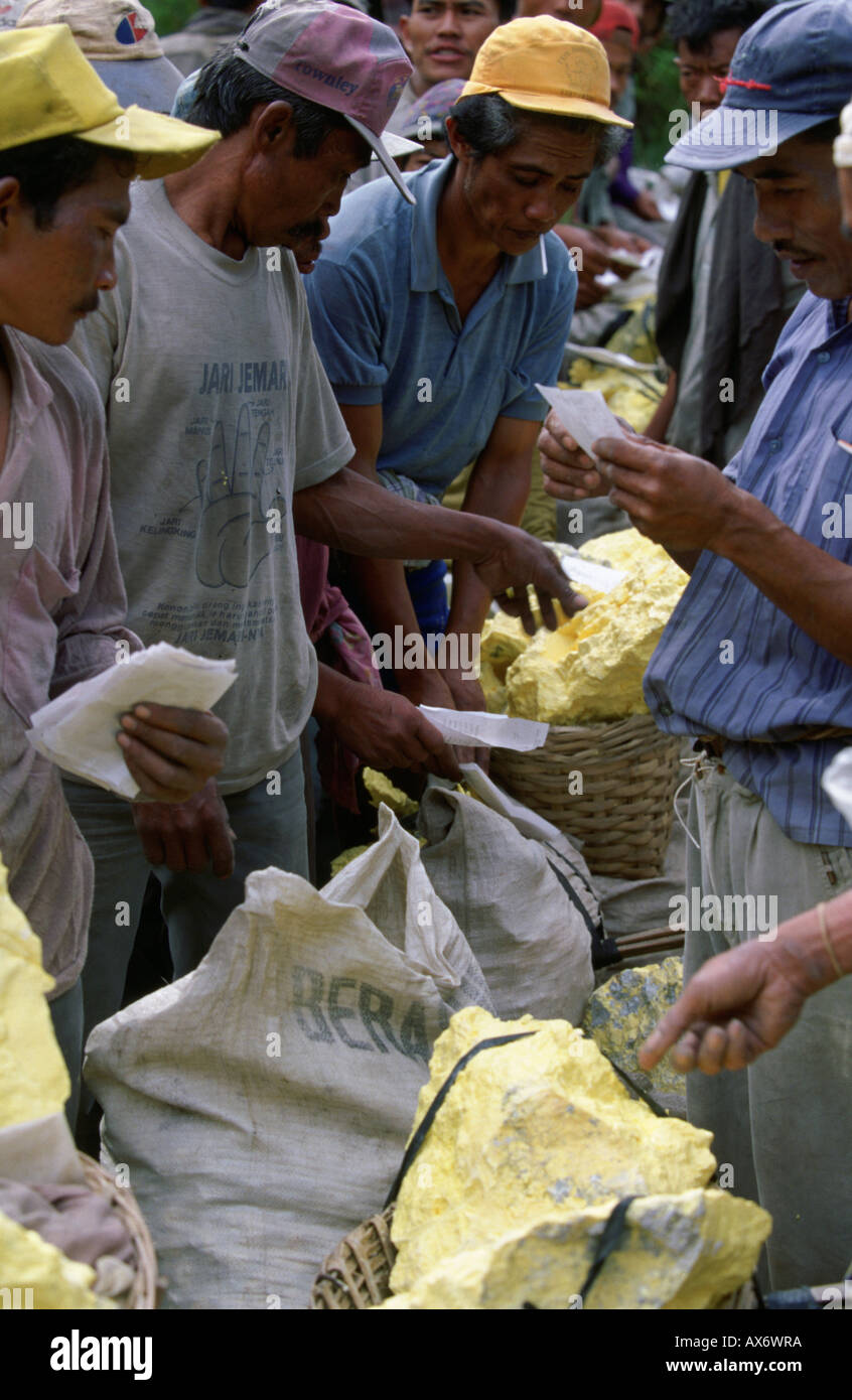 Men working inside the live volcano of Kawah Ijen in East Java ...